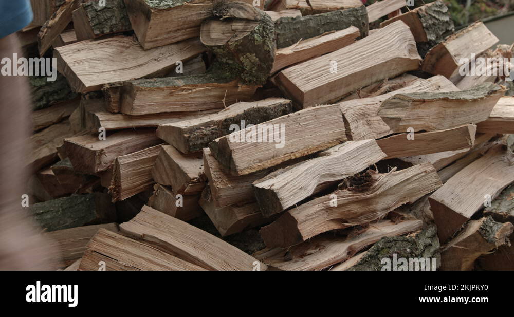 Man stacking woodpile, red oak fire wood - with audio Stock Video ...