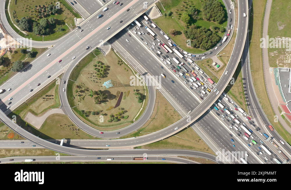 Intersections in metropolis. Traffic on highway at summer. Real speed ...