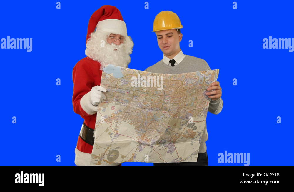 Santa Claus with a Young Architect reading a map, Blue Screen Chromakey ...