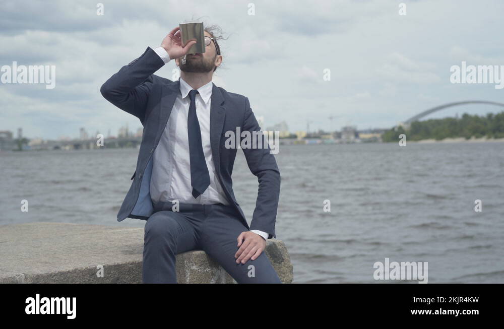 Man drinking flask Stock Videos & Footage - HD and 4K Video Clips - Alamy