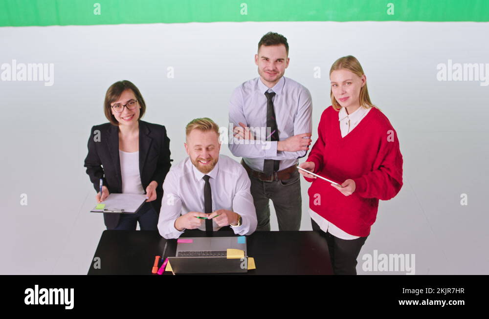 Chroma key studio charismatic good looking office team together with ...