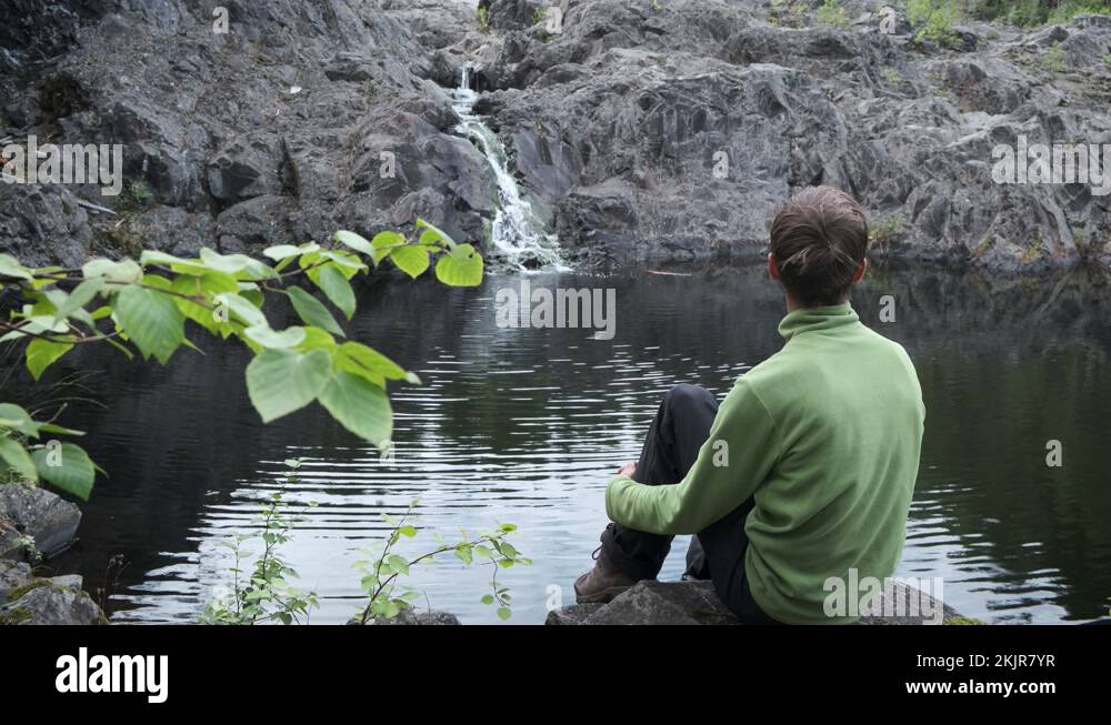 Man sitting near waterfall Stock Videos & Footage - HD and 4K Video ...