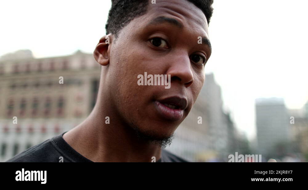 Black man shock reaction. African guy reacting with surprise to news ...