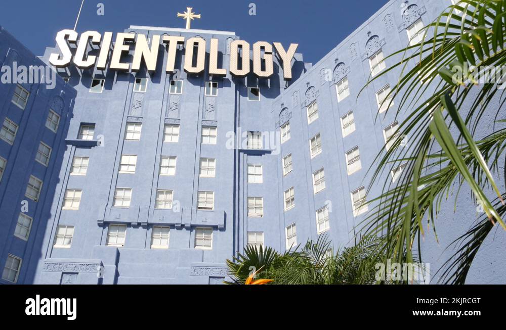 Church of Scientology exterior, facade of blue building, logo and cross ...