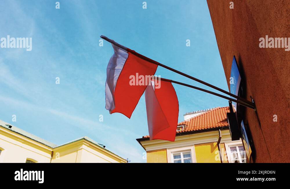 Red and white polish flag on a building in Warsaw, Poland, national ...