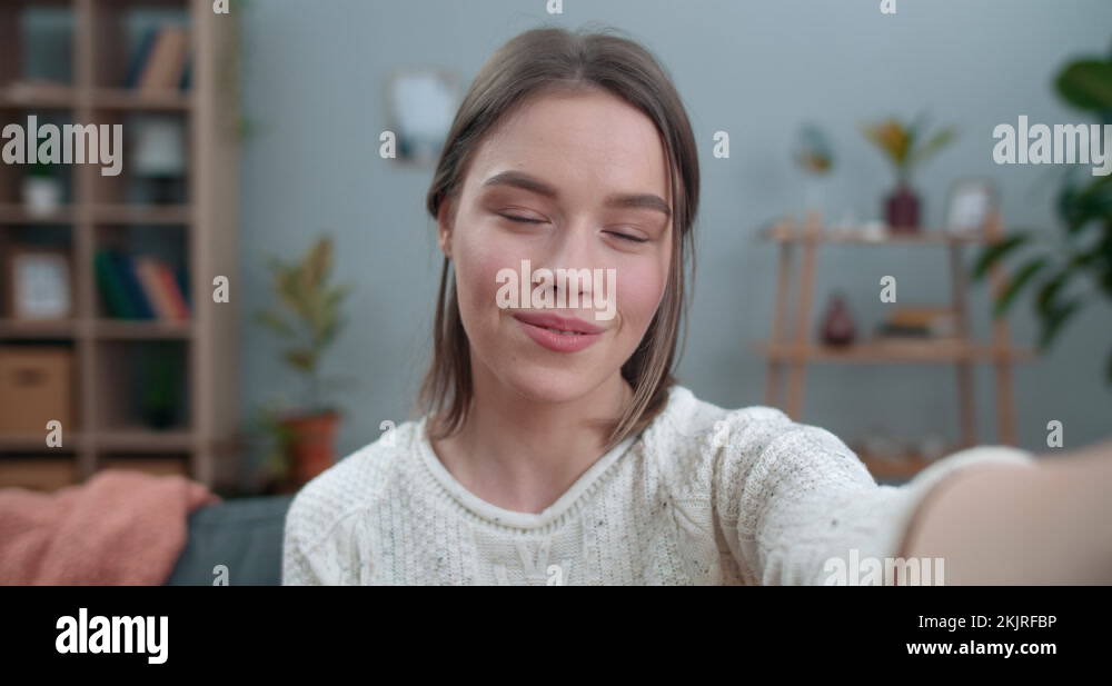 Close up view of millennial woman having video call and using frontal ...