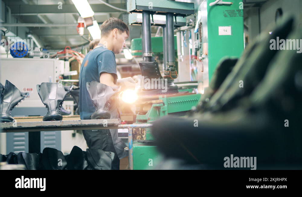 Factory workers using industrial equipment Stock Videos & Footage - HD ...