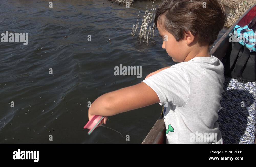 Kid fishing for crab Stock Videos & Footage - HD and 4K Video Clips - Alamy