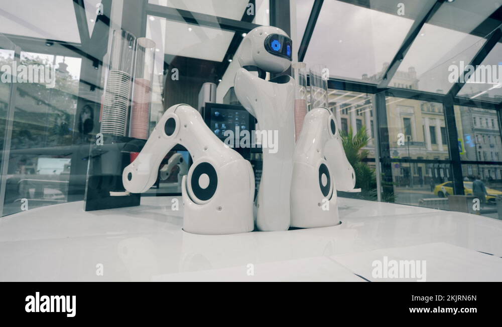 Futuristic coffee bot at work in a robot cafe. Robot, innovation, ai ...