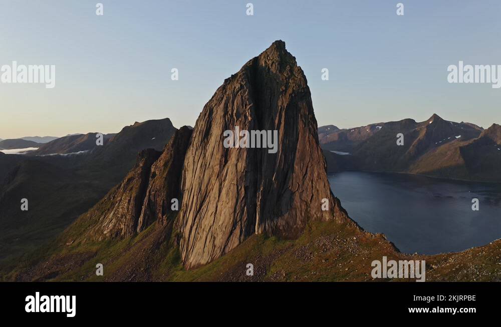 Segla mountain in Lofoten Norway in Senja island fjord aerial sunrise ...