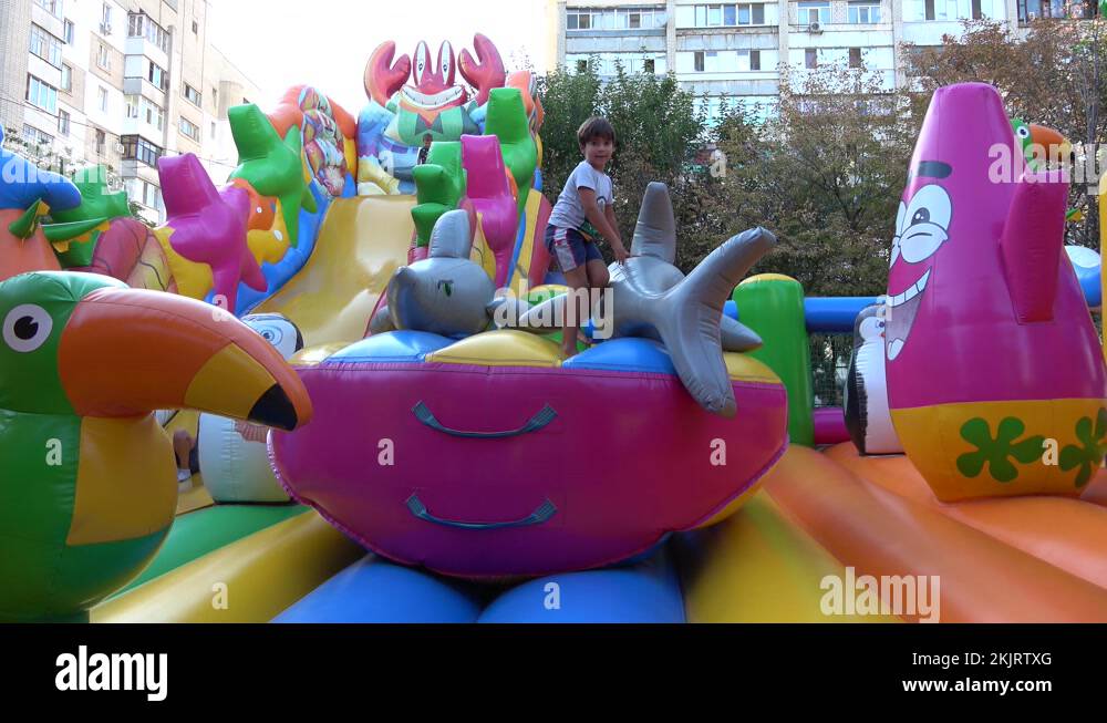 Children bounce on bouncy castle Stock Videos & Footage - HD and 4K ...
