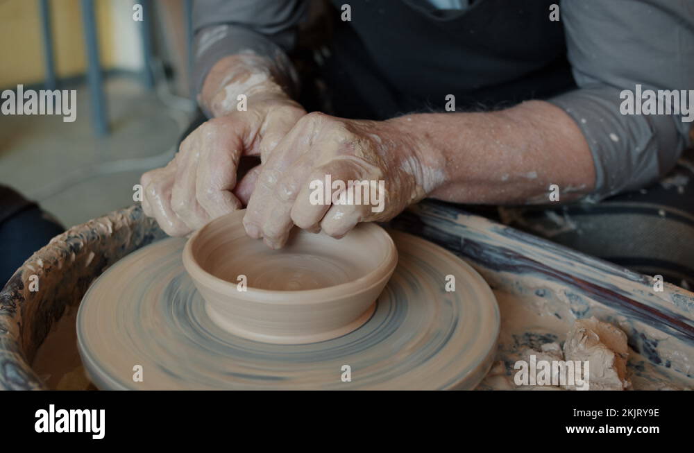 Throwing pot on potters wheel Stock Videos & Footage - HD and 4K Video ...