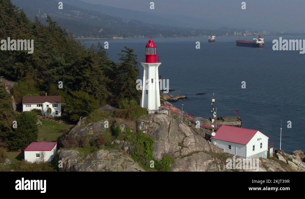 Aerial Orbiting Shot of Point Atkinson Lighthouse in West Vancouver, BC ...