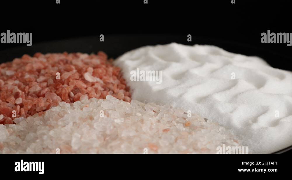 Different salt types rotating on black background 1 Stock Video Footage ...