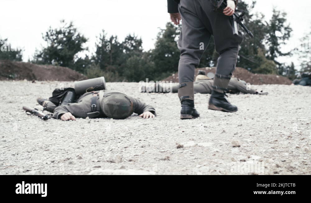Second World War soldier survivor walk between dead bodies 4K Stock ...