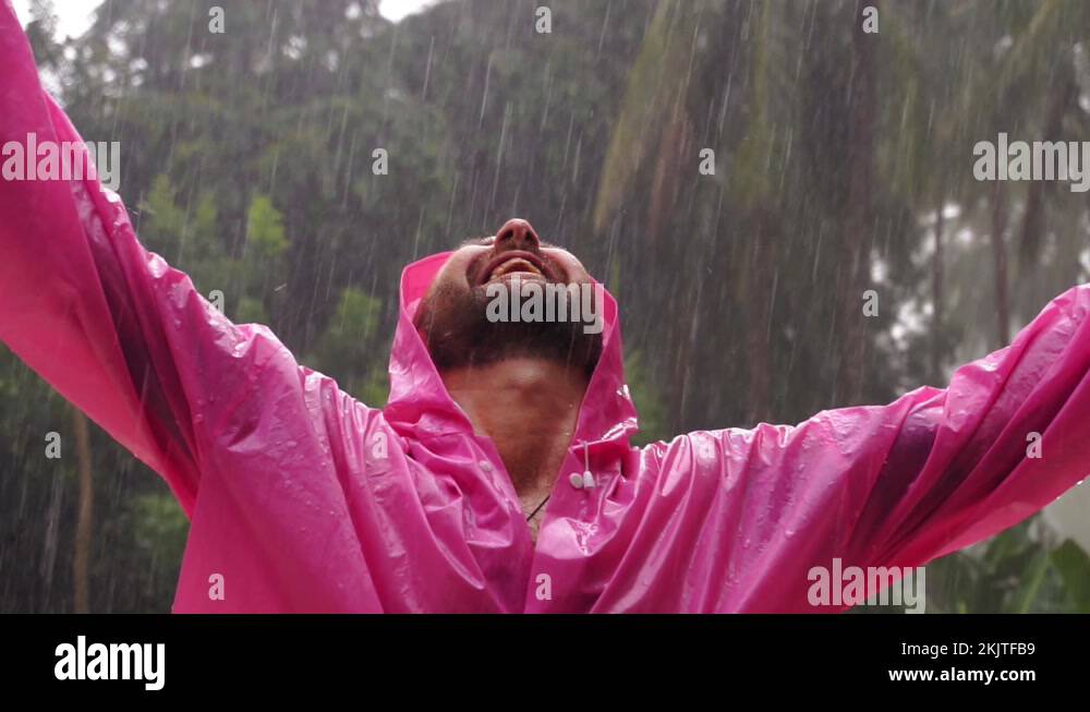 Pink raincoat Stock Videos & Footage - HD and 4K Video Clips - Alamy
