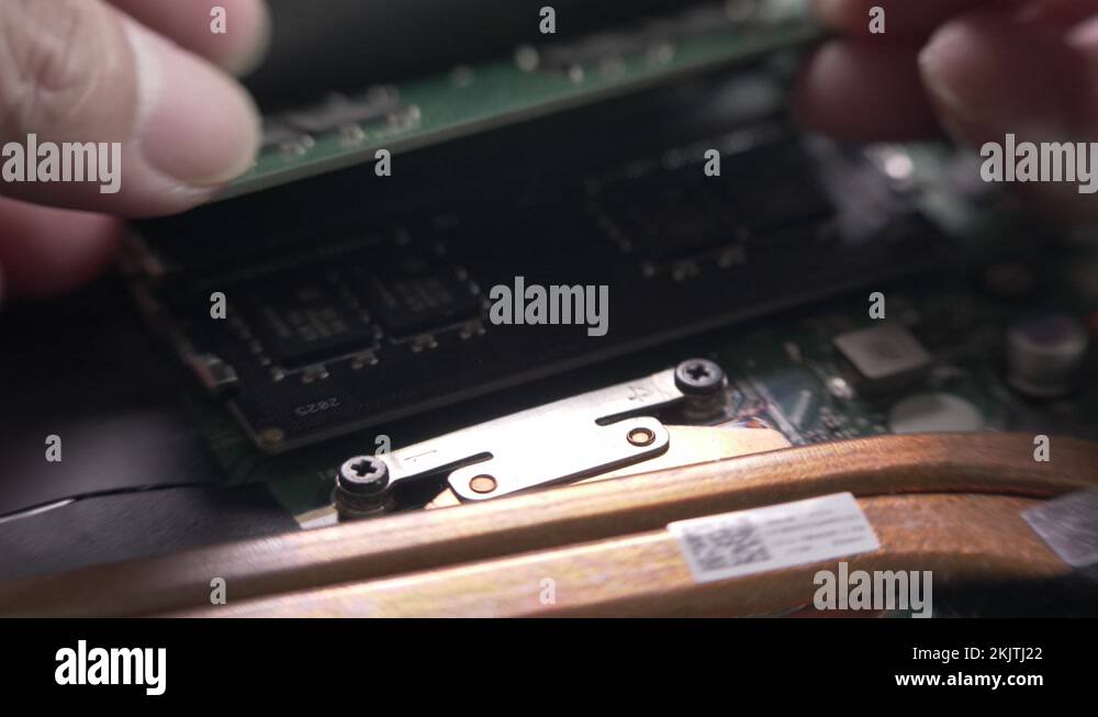 DIY project removing laptop memory at home close up, shallow DOF 4K 60p ...