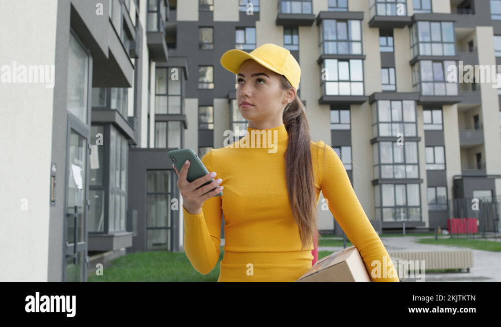 Girl Delivery Service Worker Comes To The Door And Throws Box. She ...