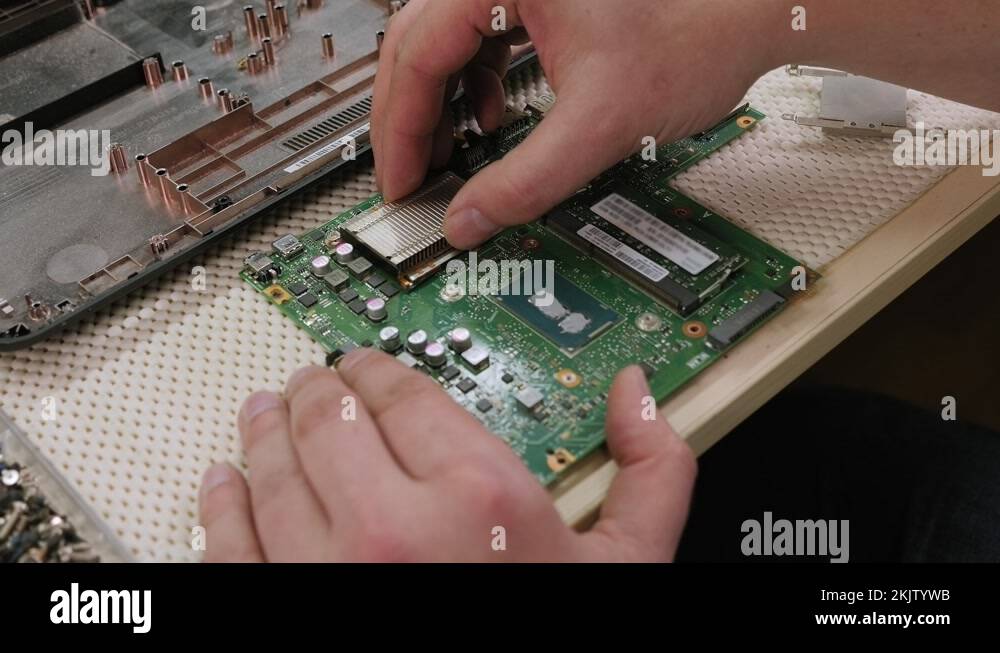 Applying thermal paste to the laptop processor Stock Video Footage - Alamy