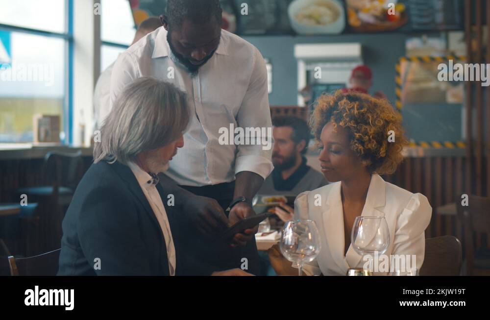 Restaurant showing dinner menu waiter Stock Videos & Footage - HD and ...