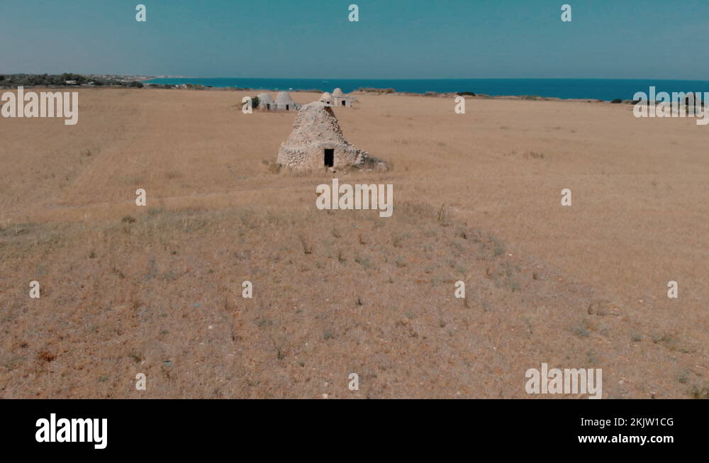 Trulli in Puglia. Famous ancient Trulli houses in Apulia. Aerial top ...