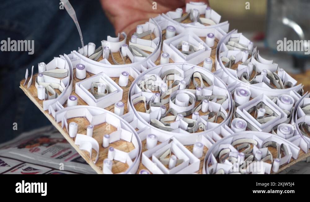 How to glue the batik pattern from paper Stock Video Footage - Alamy