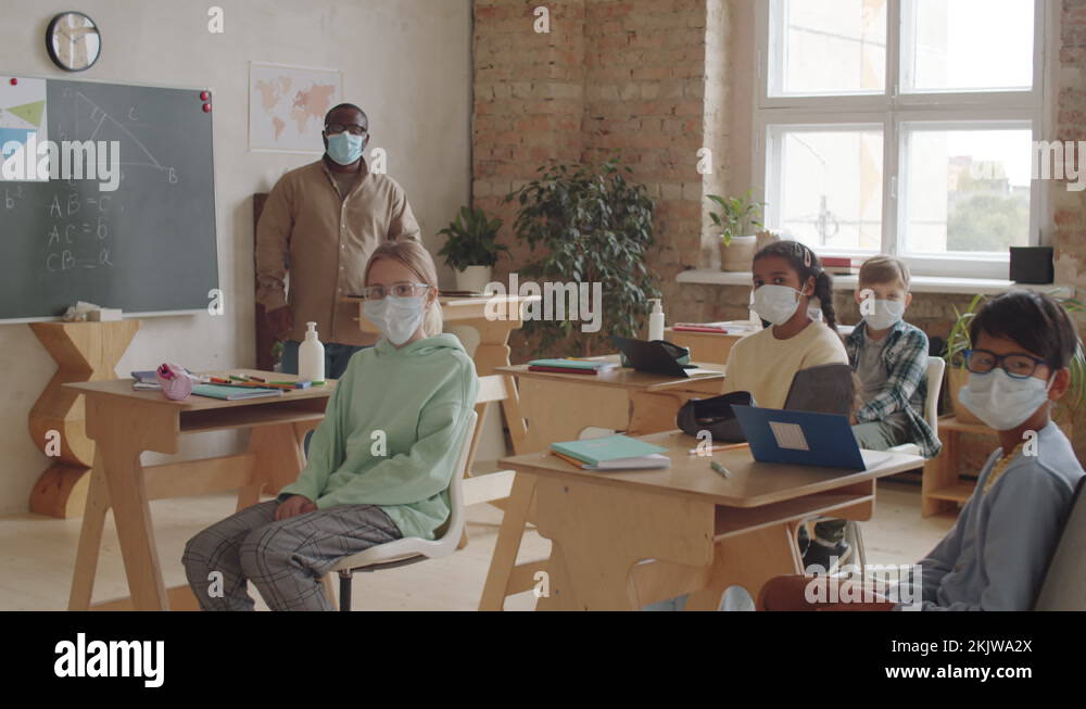 School kids masks classroom Stock Videos & Footage - HD and 4K Video ...