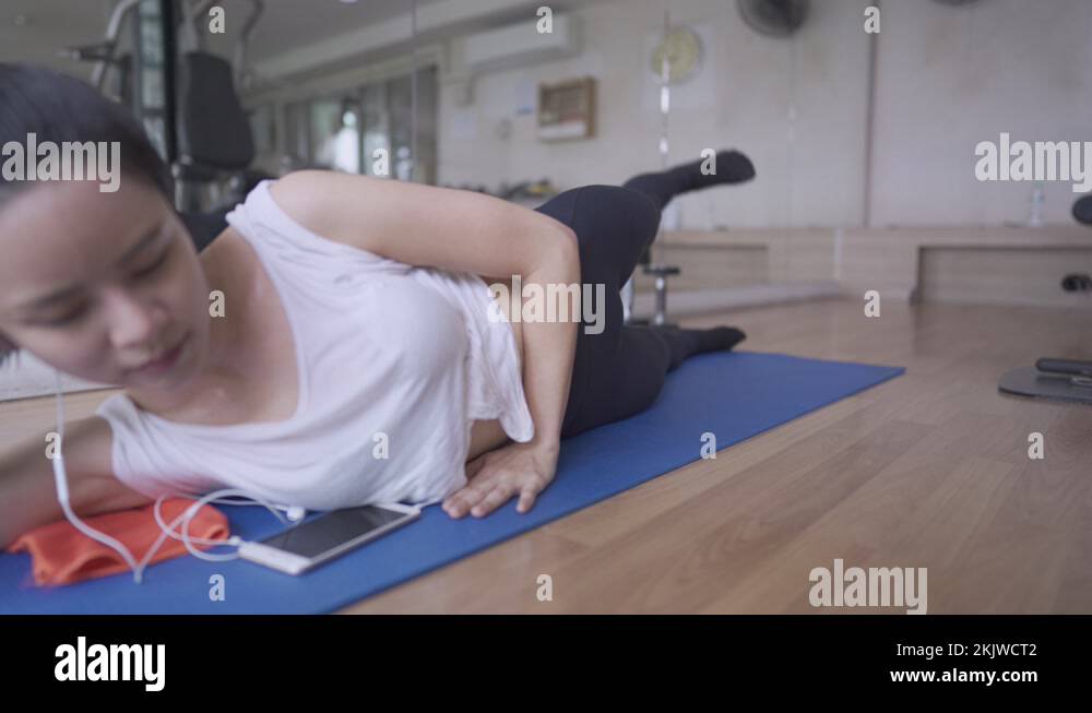 female doing side abdominal oblique exercise for strong tight core ...