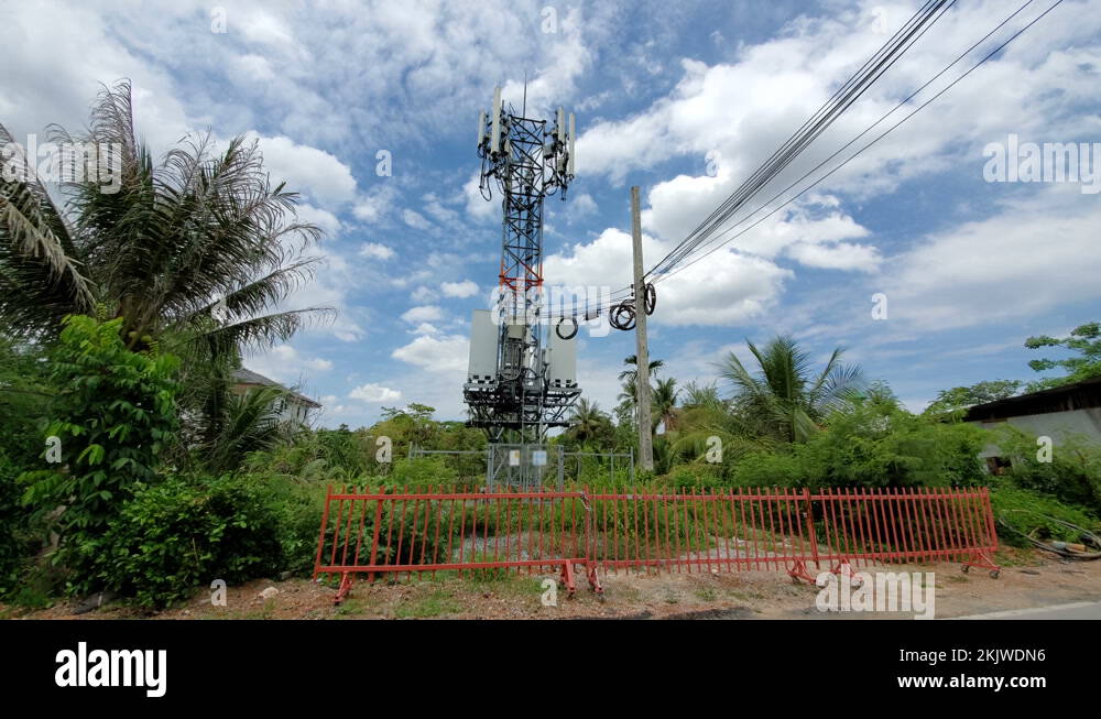 5G and 4G LTE cell tower in rural countryside of generic developing ...