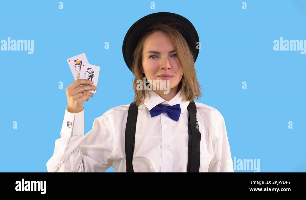 Croupier Woman in a White Shirt and Hat Shows Playing Cards and Smiles ...