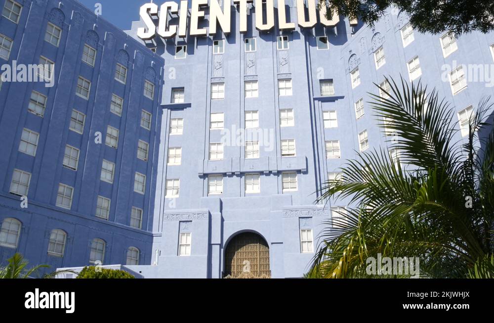 Church of Scientology exterior, facade of blue building, logo and cross ...
