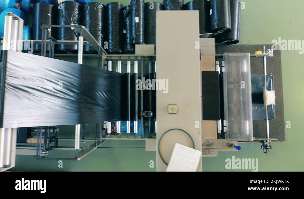 Plastic bag manufacturing machine. Top view Stock Video Footage - Alamy