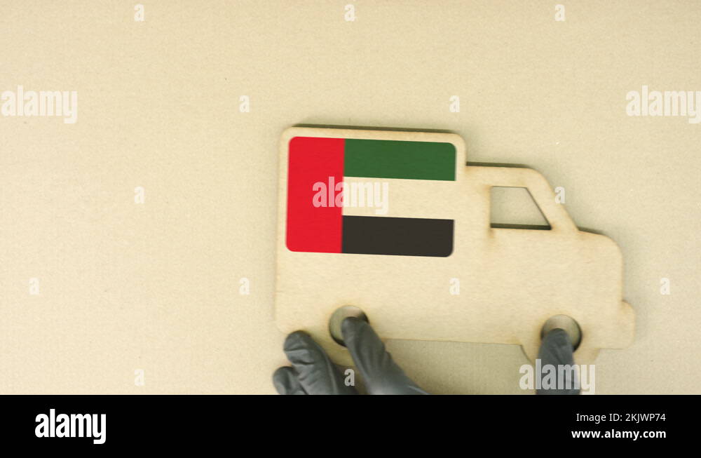 Recycled cardboad truck icon with flag of the UAE. National sustainable ...