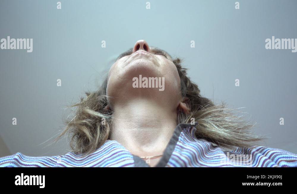 Woman stooping Stock Videos & Footage - HD and 4K Video Clips - Alamy