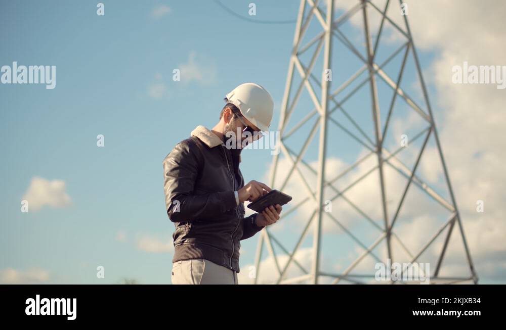Constructor Inspect High Voltage Power Lines.Constructor Electrical ...