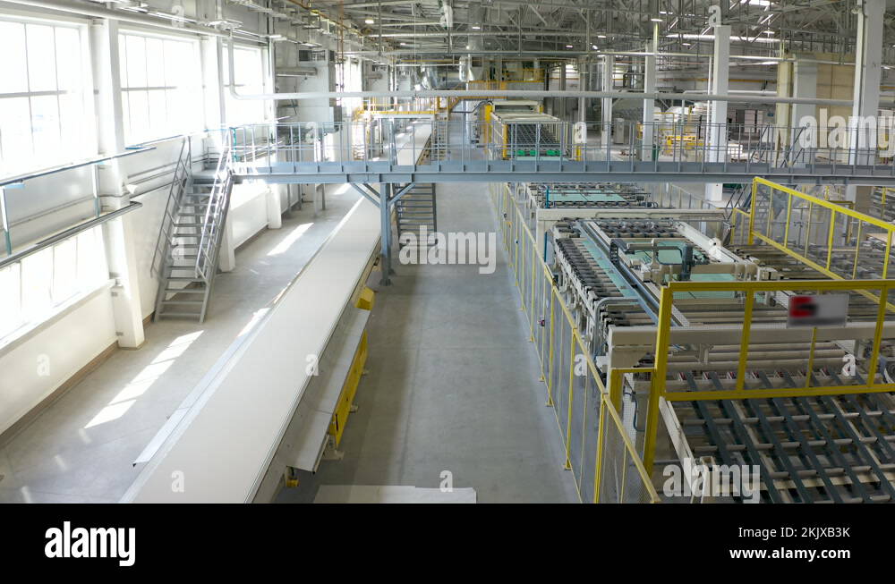 Manufacturing plasterboard sheets or gypsum board by conveyor on ...