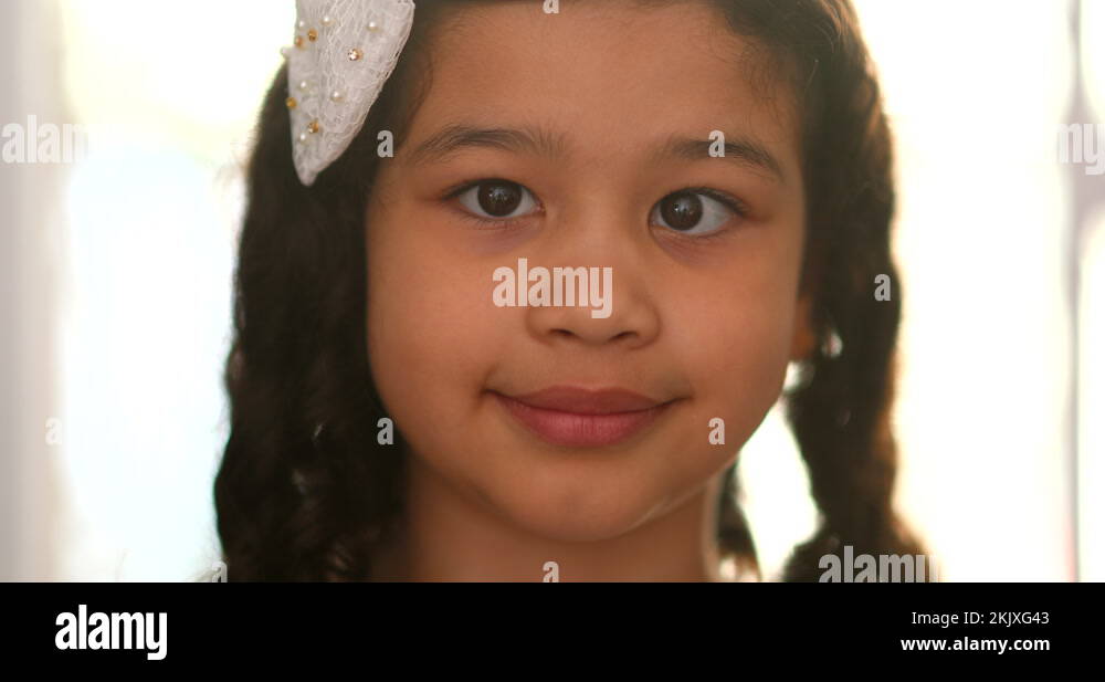 Funny little girl doing crossed eyes Stock Video Footage - Alamy
