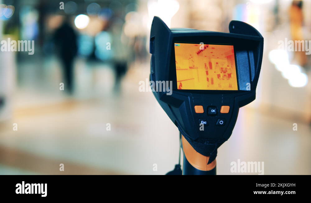 Thermovision device is scanning temperature in a public place Stock ...