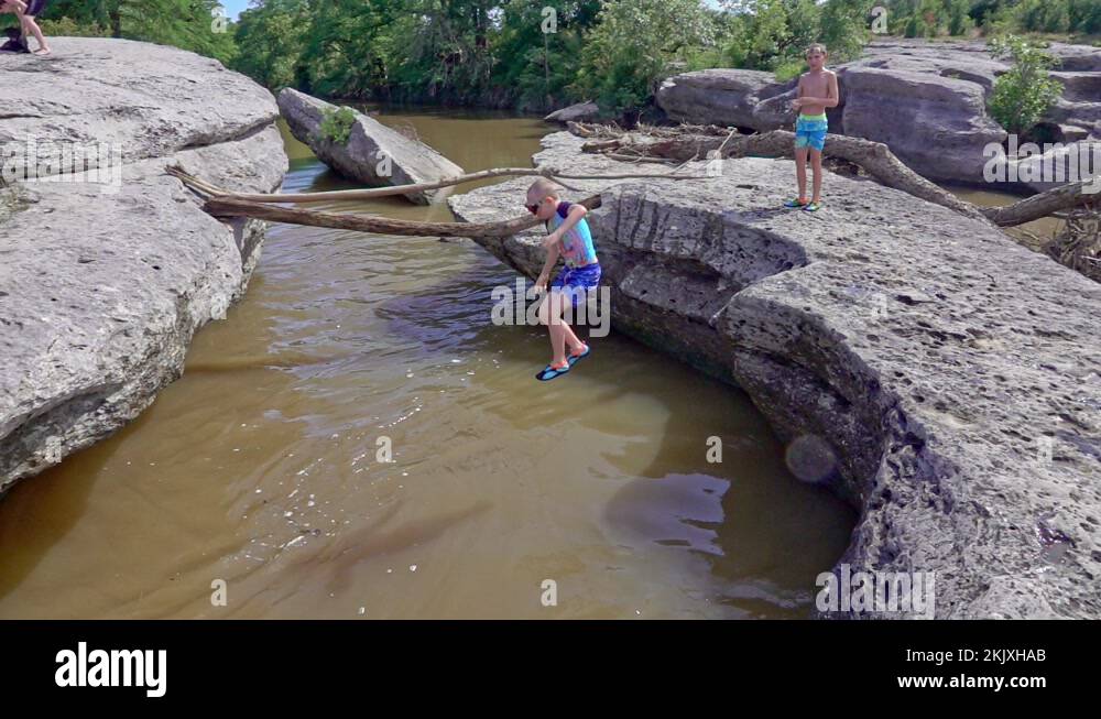 Boy jumping into river Stock Videos & Footage - HD and 4K Video Clips ...