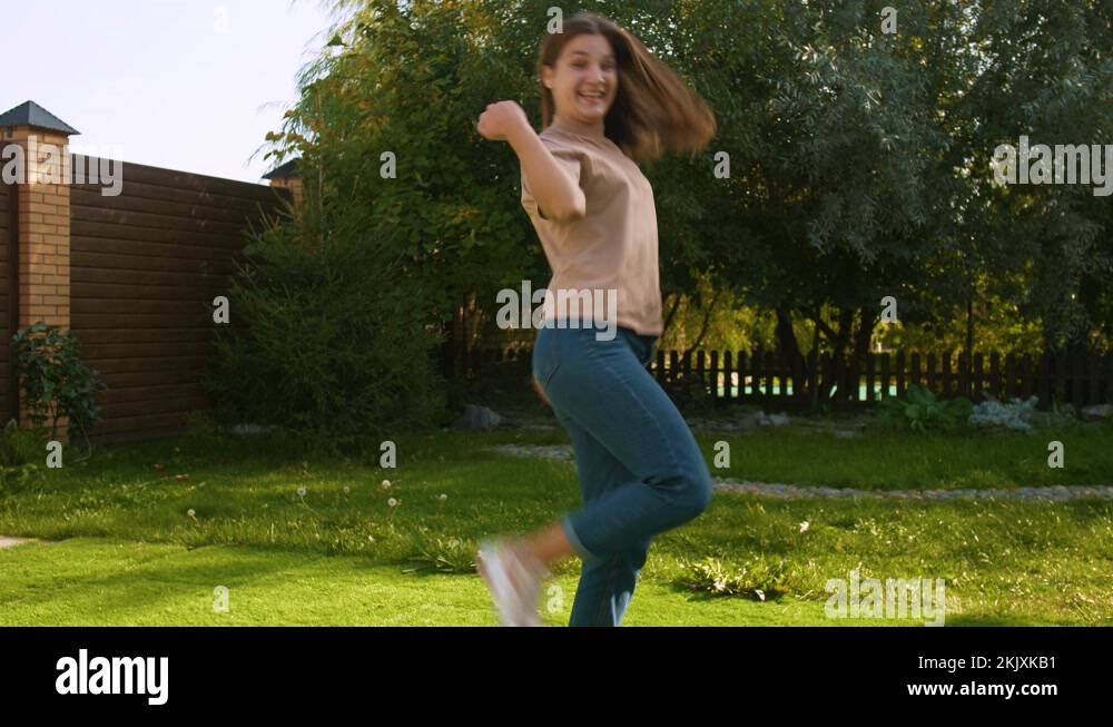 Beautiful teenage girl dancing vigorously dance with viral backpack and ...