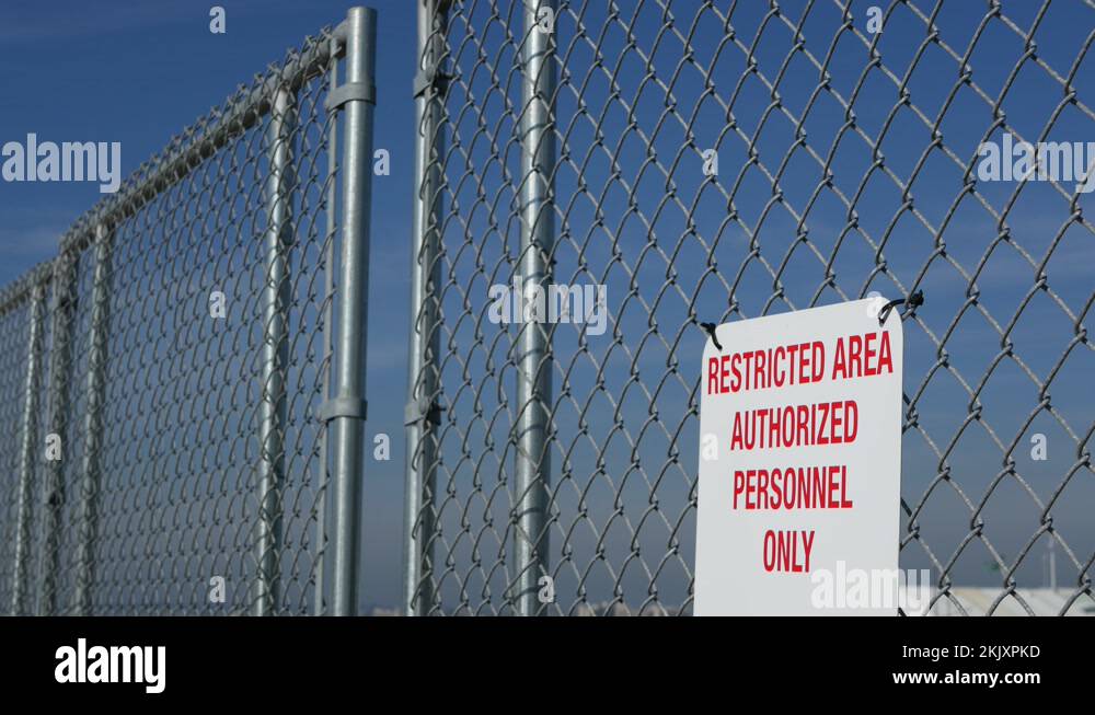 Restricted area, authorized personnel only sign in USA. Red letters ...