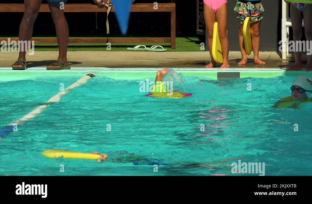 CABO SAN LUCAS MEXICO-2020: Children Wearing Caps Swim In Pool While ...