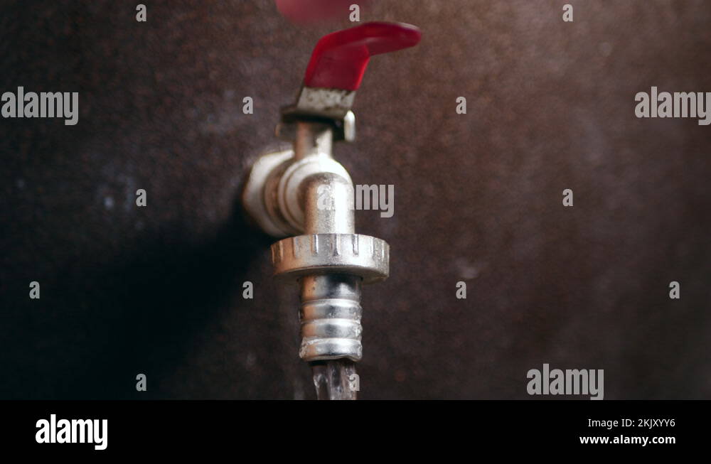 Hand Turning Tap Of Washbasin On. Man Hand Is Opening Tap And Water ...