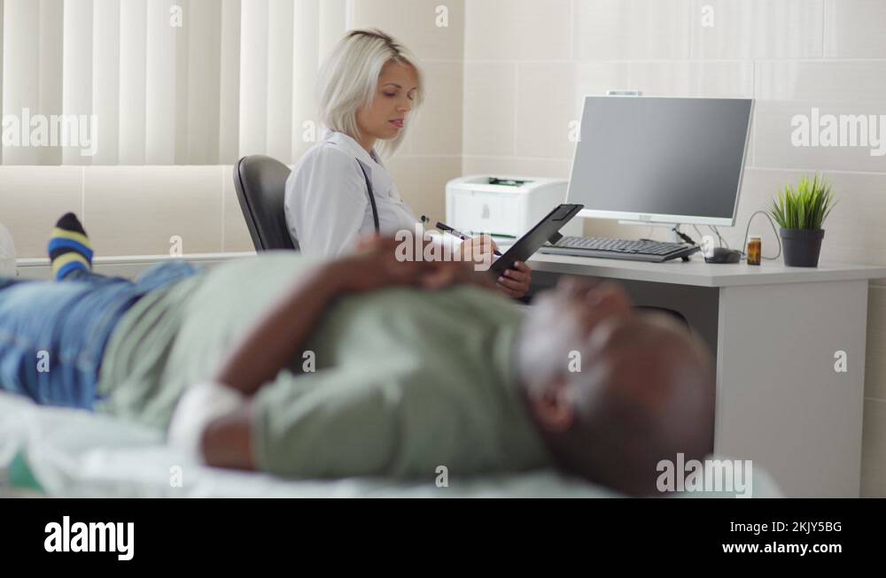 Female doctor asking questions to patient Stock Video Footage - Alamy