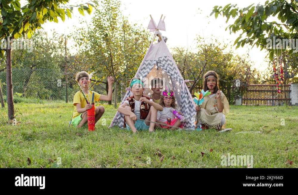 Childrens Holiday. Five Children Play Indians. Three Boys And Two Girls ...