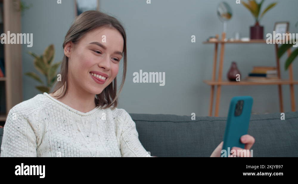 Crop view of deaf woman having video conversation and showing with sign ...