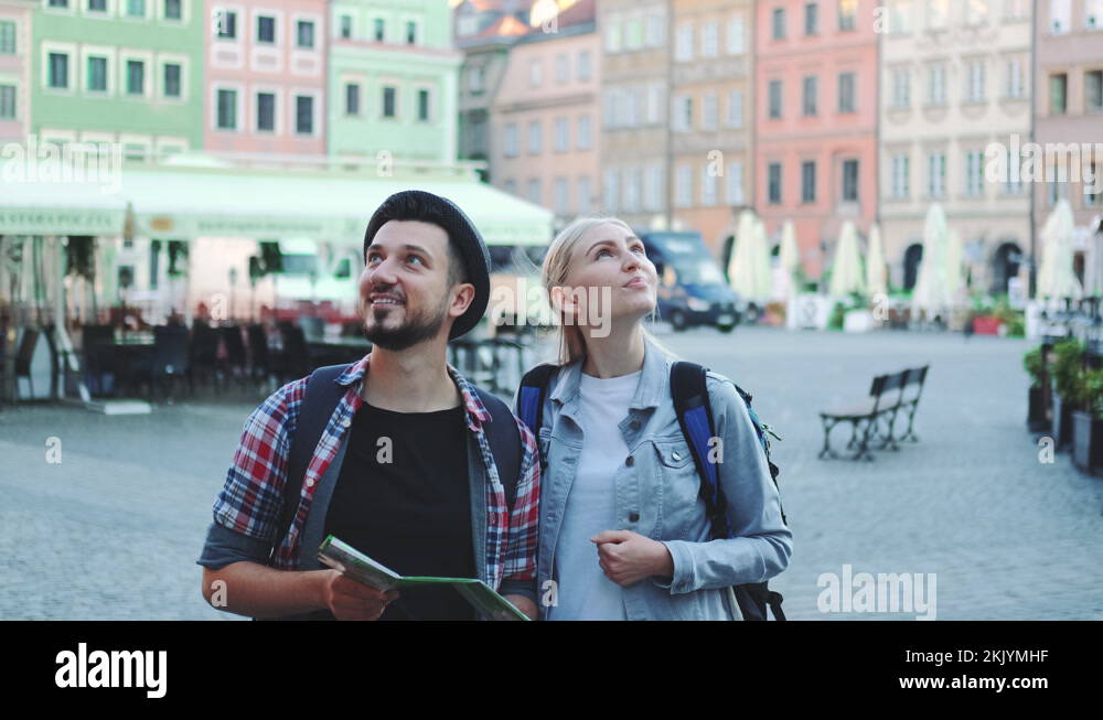Tourists looking on main tourist attractions using map Stock Video ...