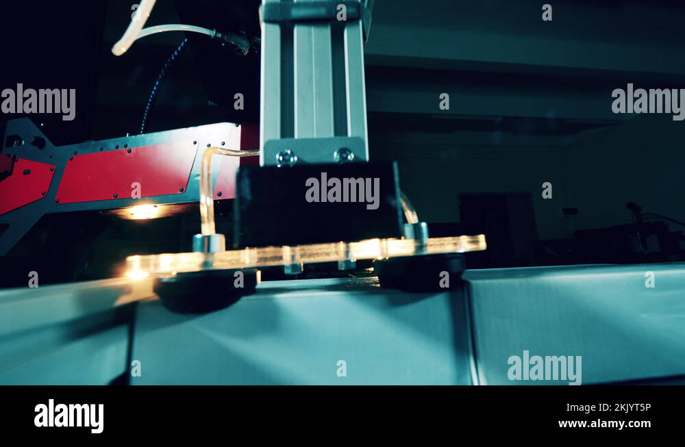 Robotic arm is relocating carton boxes from the conveyor Stock Video Footage - Alamy
