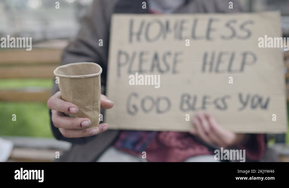 Begging cup Stock Videos & Footage - HD and 4K Video Clips - Alamy