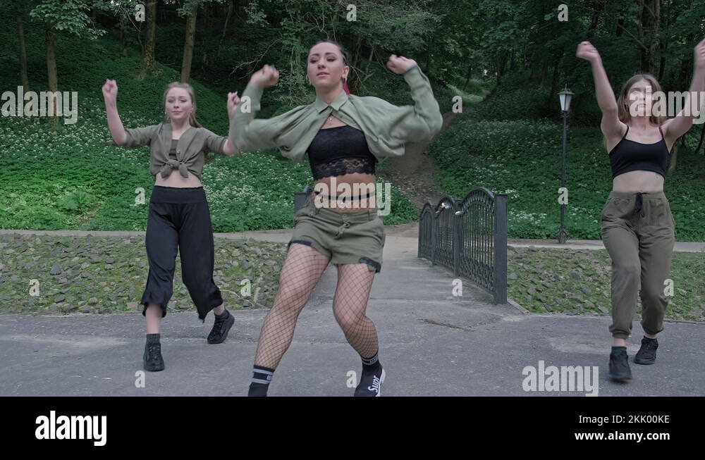 Beautiful women dancing outdoor. Female street dancers. Hip hop dancers ...